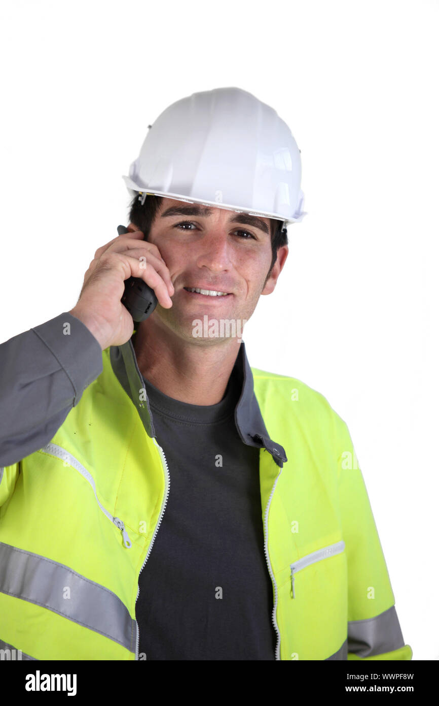 Foreman using radio receiver Stock Photo - Alamy