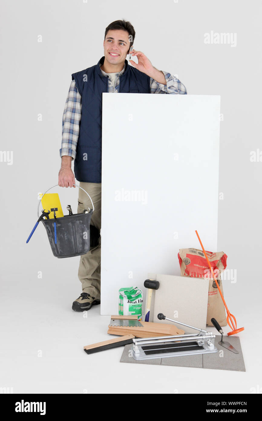 Tile cutter holding tool hi-res stock photography and images - Alamy