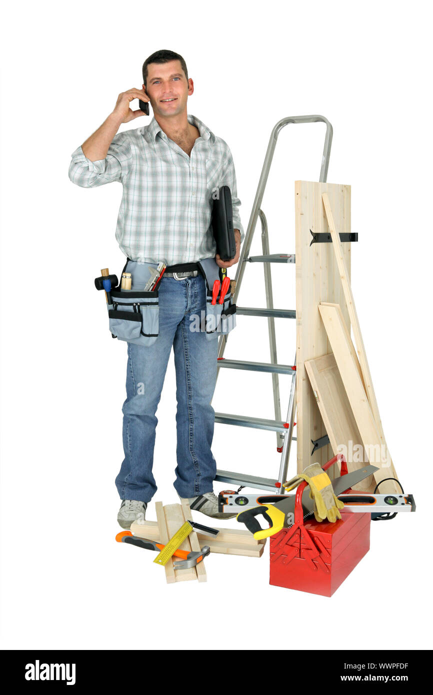 Handyman talking to a supplier Stock Photo - Alamy