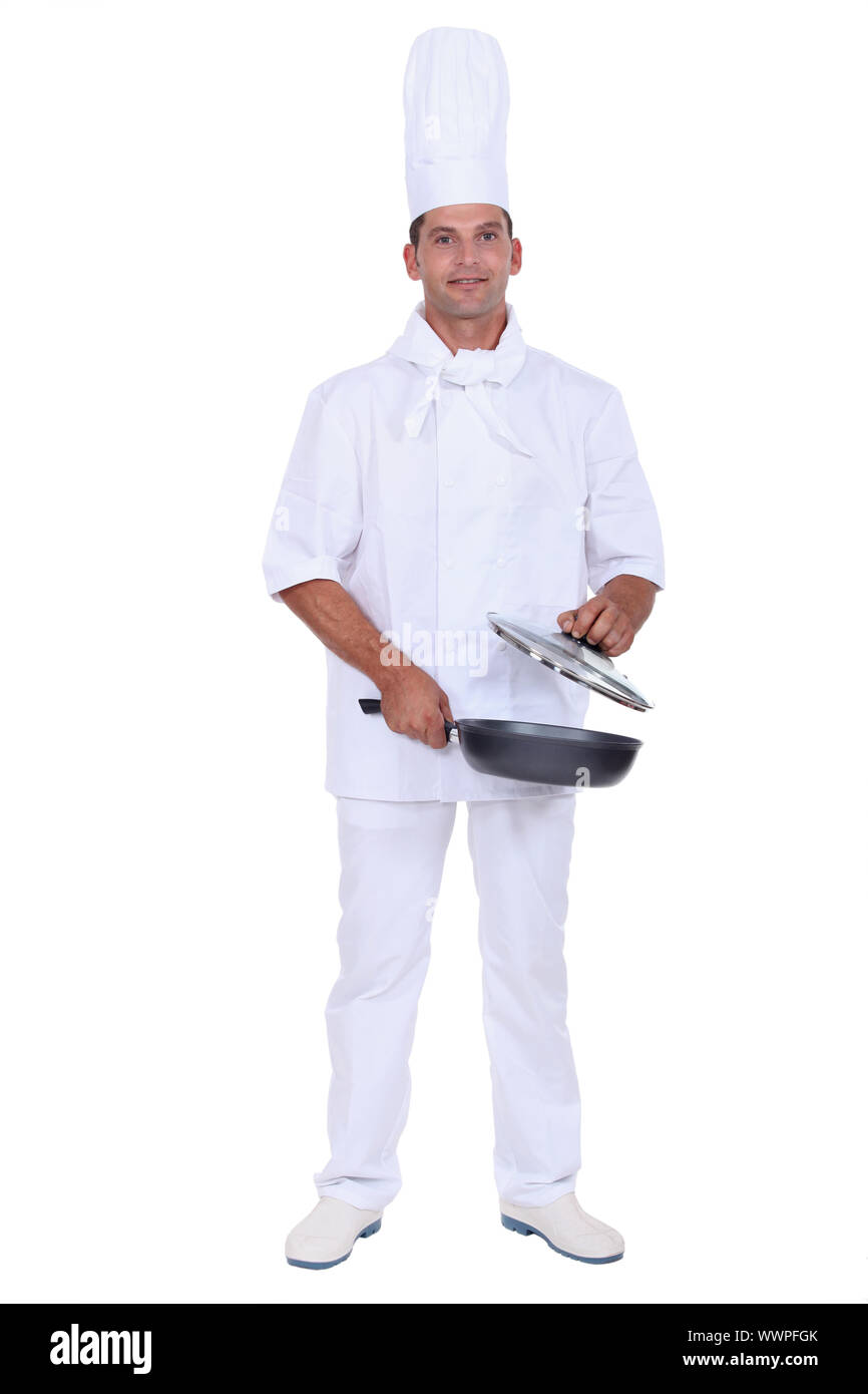 Chef with a frying pan Stock Photo - Alamy
