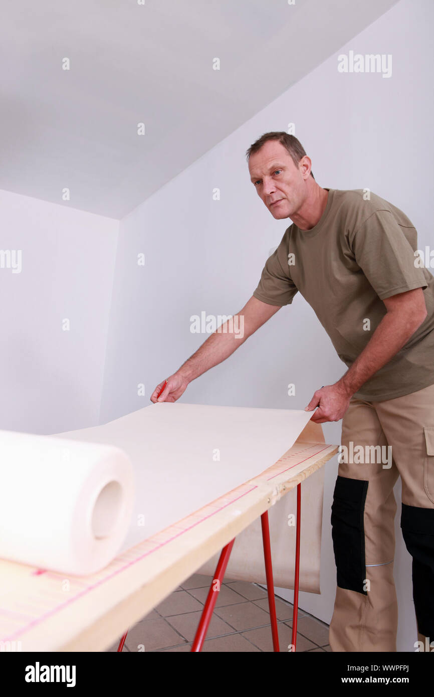 Unrolling paper hi-res stock photography and images - Alamy