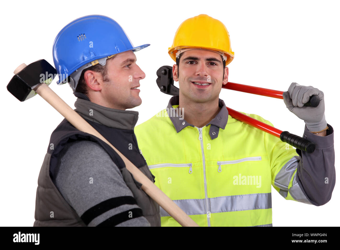 Two builders with tools Stock Photo - Alamy