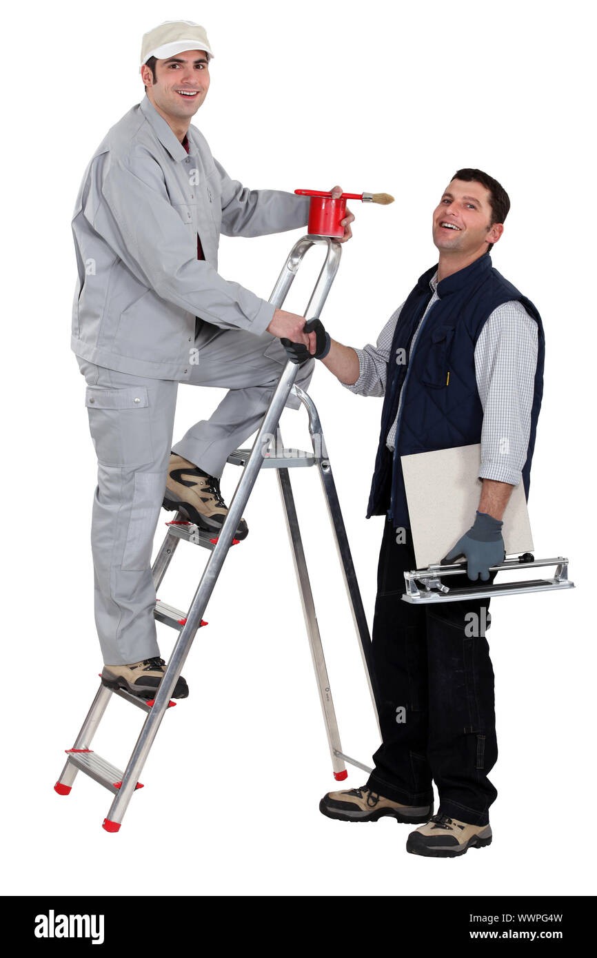 A painter and a tiler Stock Photo - Alamy