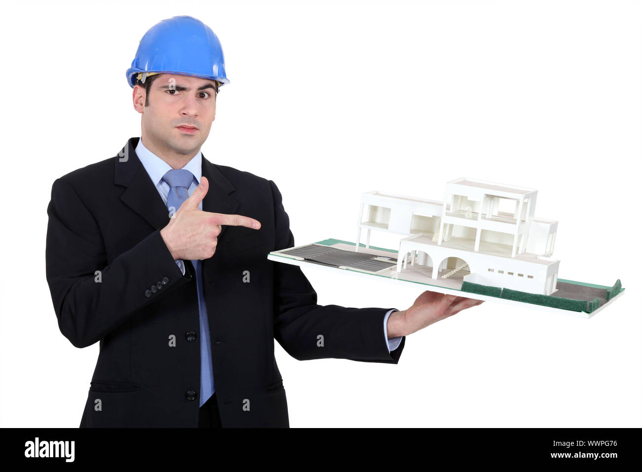 Construction worker showing plan Cut Out Stock Images & Pictures - Alamy