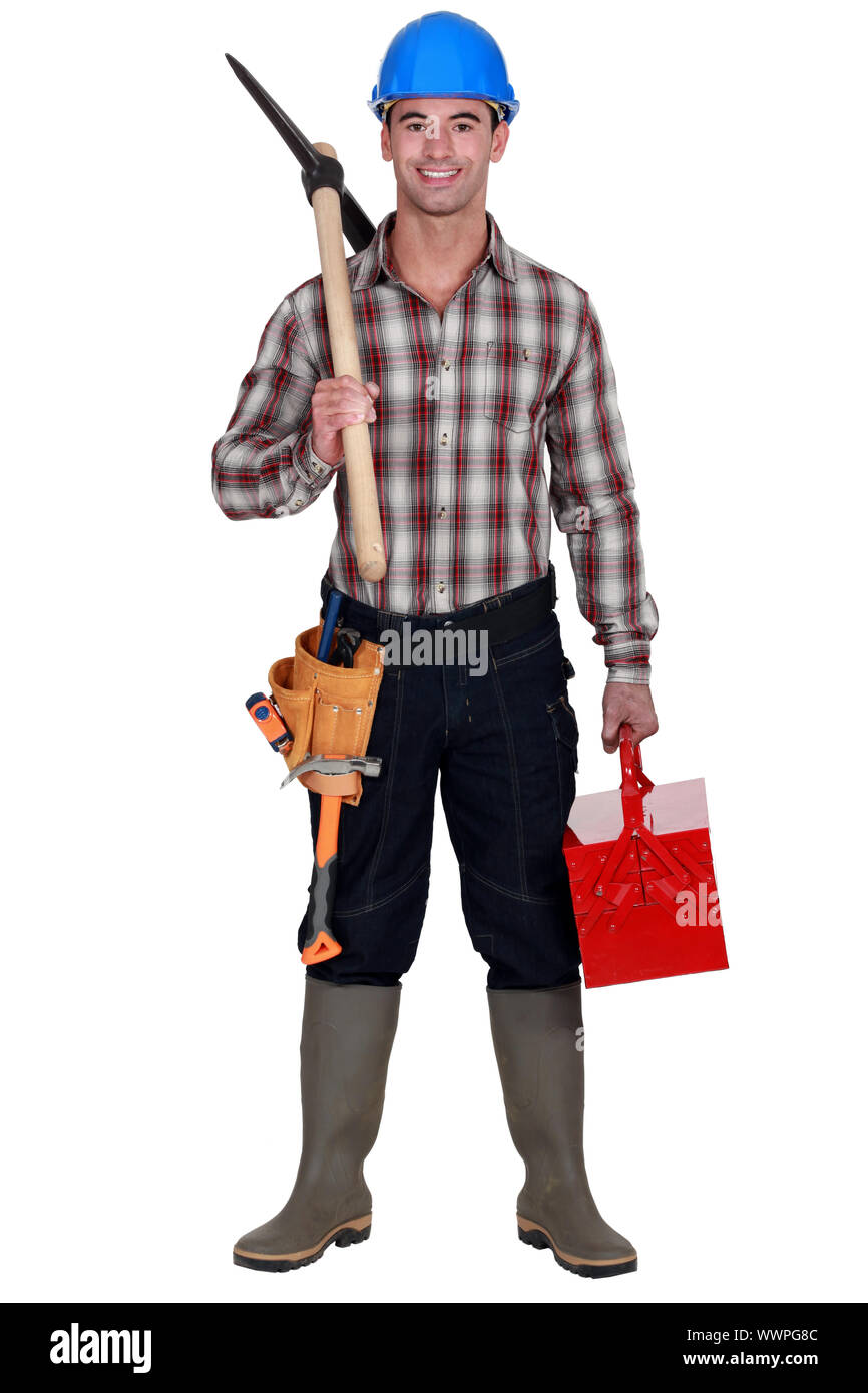 Happy construction worker, studio shot Stock Photo - Alamy