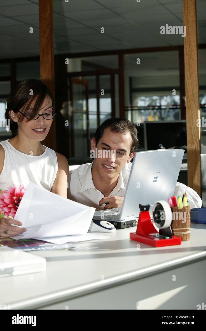 Asking colleagues for help hi-res stock photography and images - Alamy