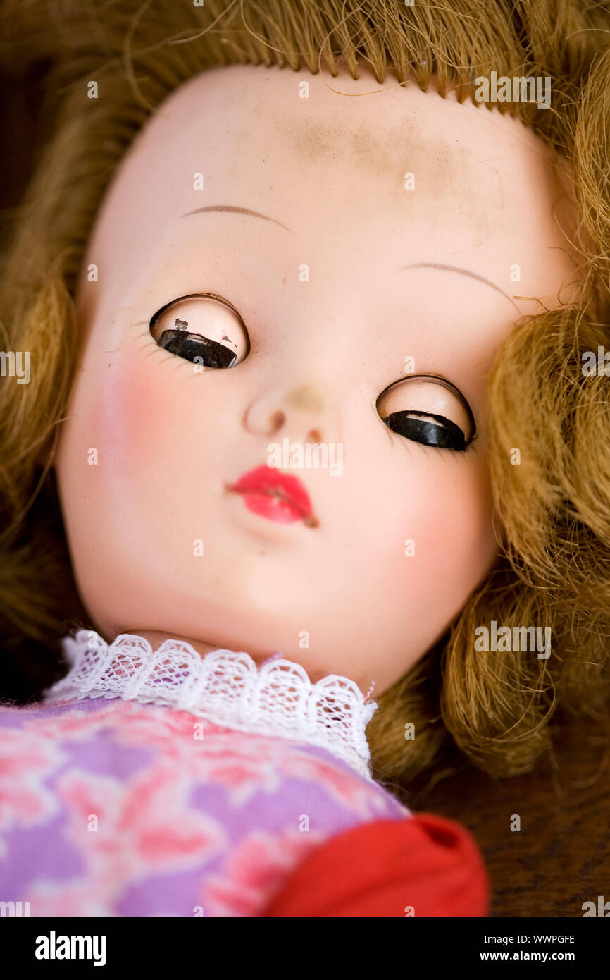 A close up of a doll face - focus on the eyes Stock Photo - Alamy