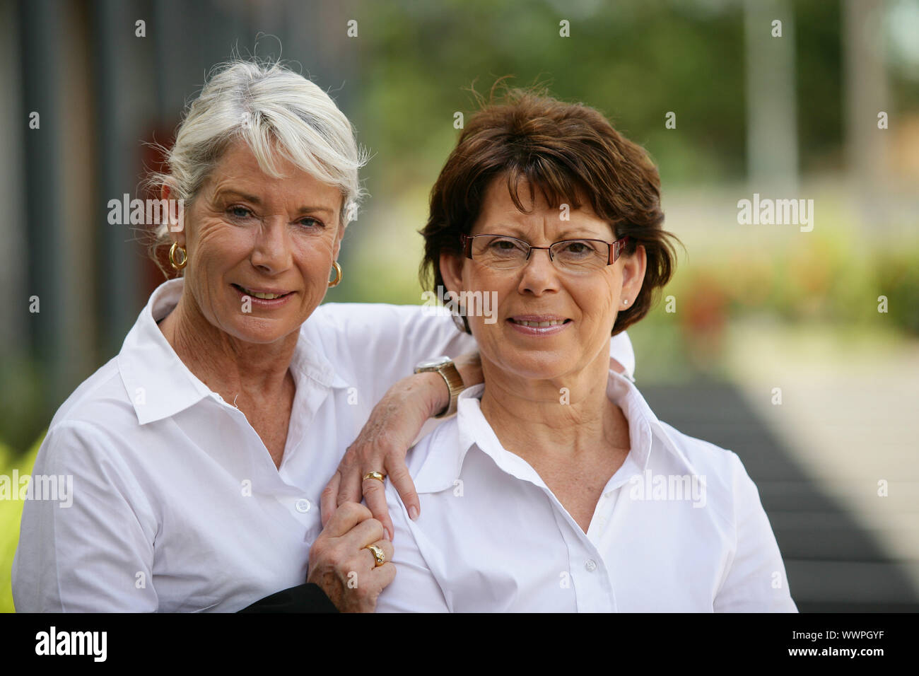 Two older women standing outside hi-res stock photography and images ...