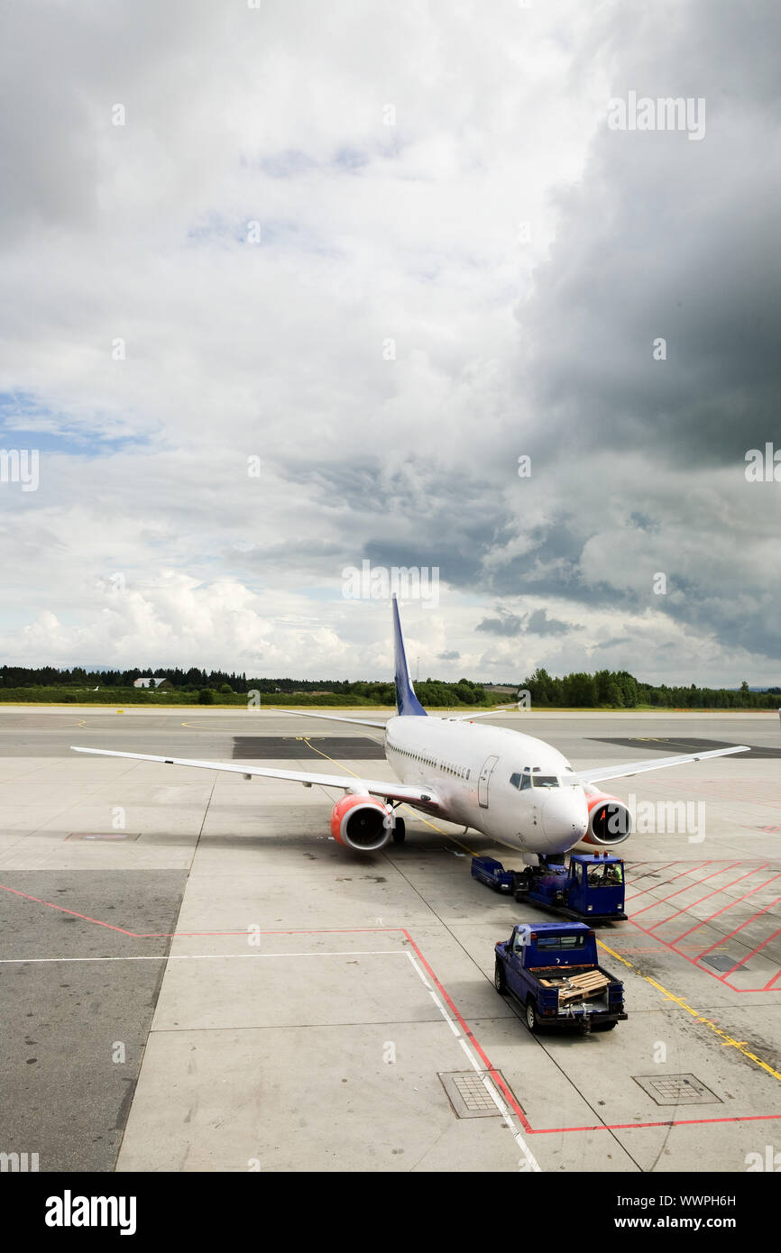 An airplane at the airport on the tarmac Stock Photo - Alamy