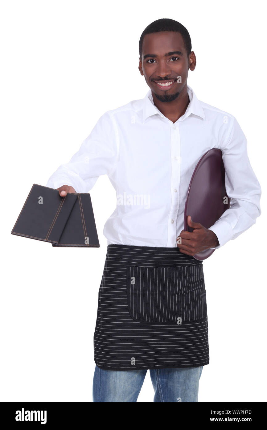 Waitor giving menus Stock Photo - Alamy