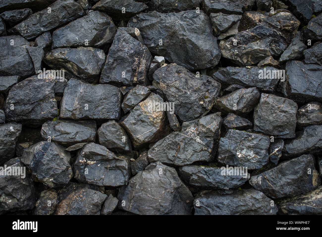 black stones wall - textures and backgrounds Stock Photo - Alamy