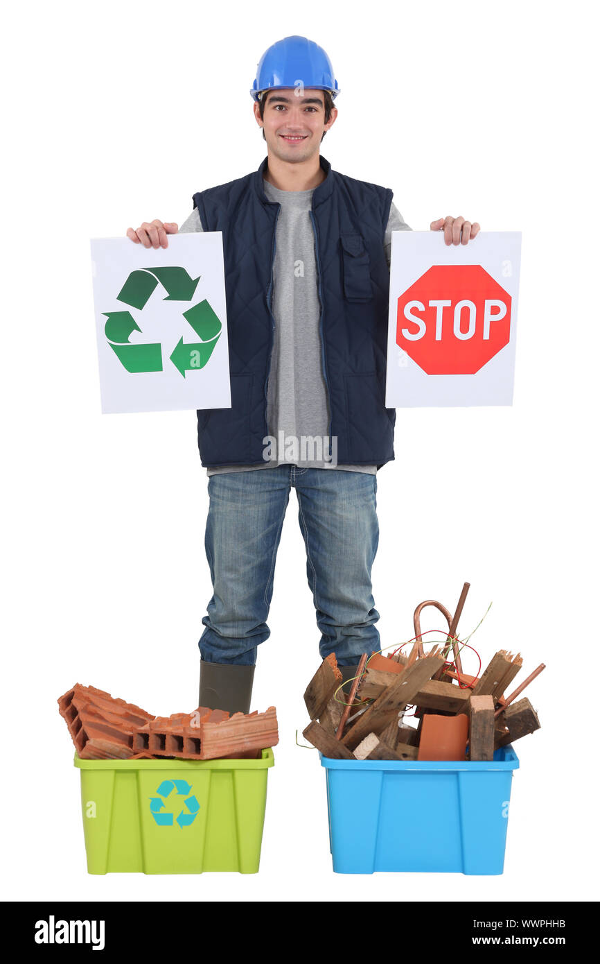 Builder with recyclable materials Stock Photo - Alamy