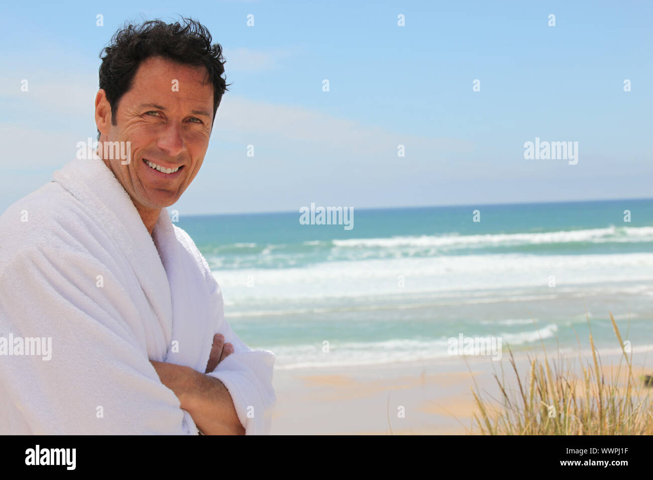 Man at the beach Stock Photo - Alamy
