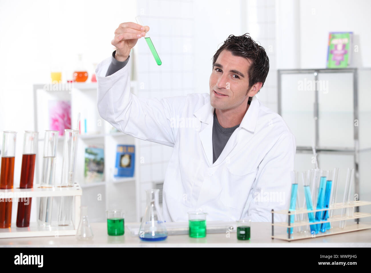Man wearing lab coat Stock Photo - Alamy