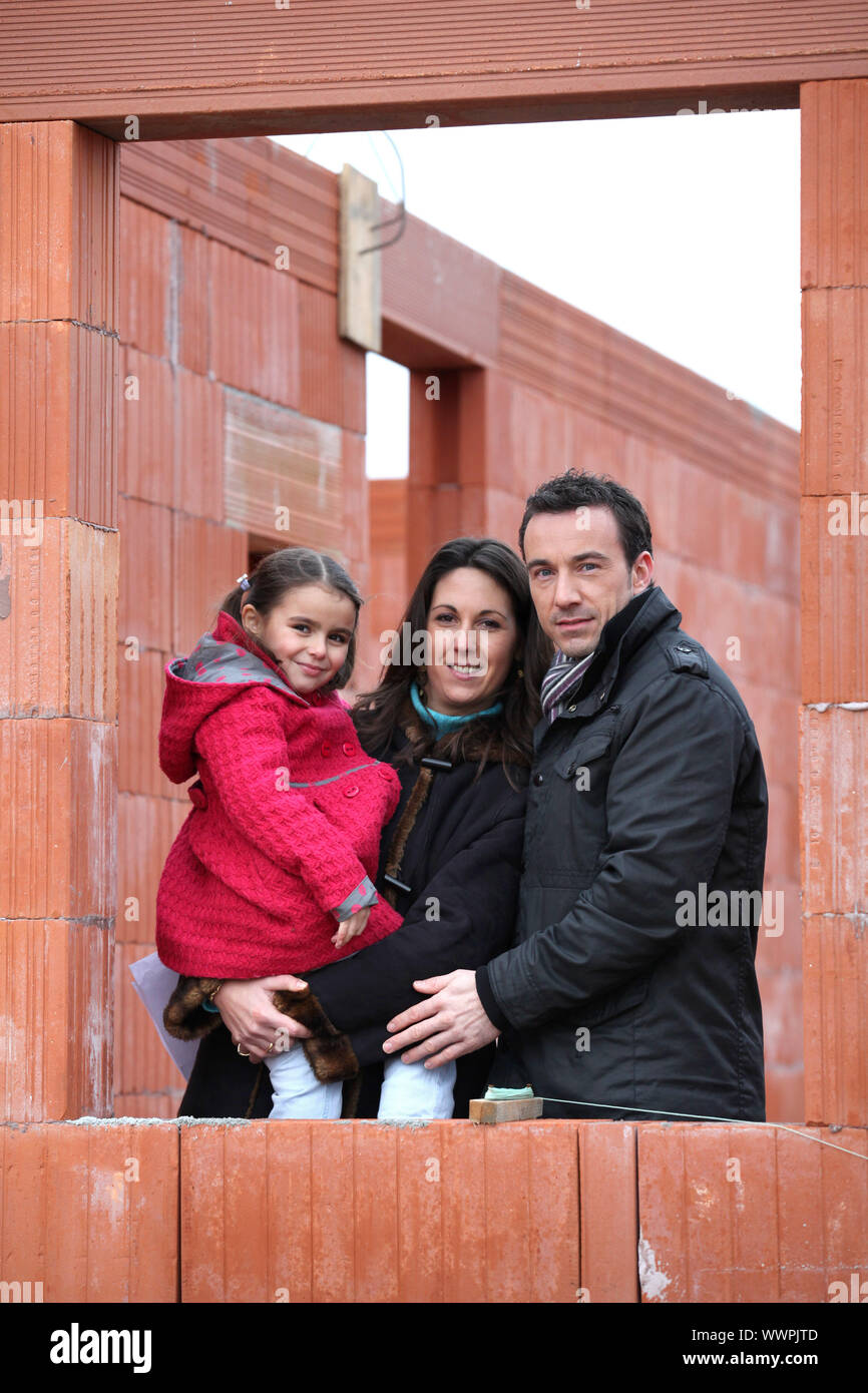 Family at construction site Stock Photo - Alamy