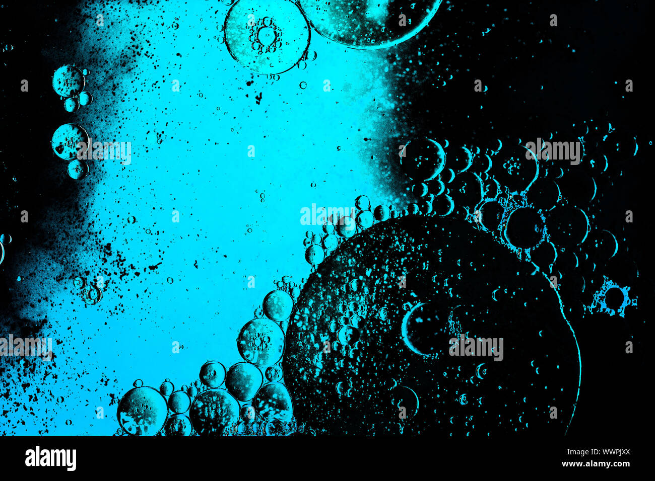 Oil bubbles inside water base form patterns Stock Photo - Alamy