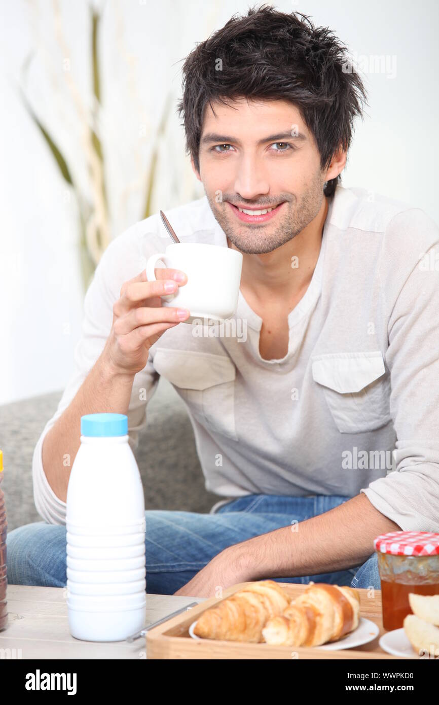 guy taking breakfast Stock Photo - Alamy