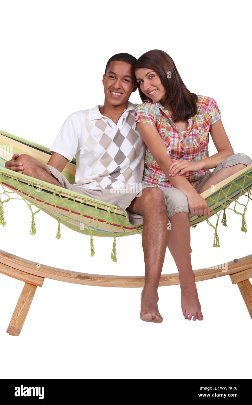 Romantic couple swing in hammock hi-res stock photography and images ...