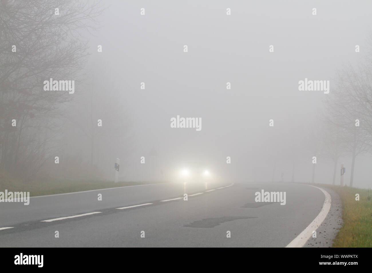 Street in the fog Stock Photo - Alamy