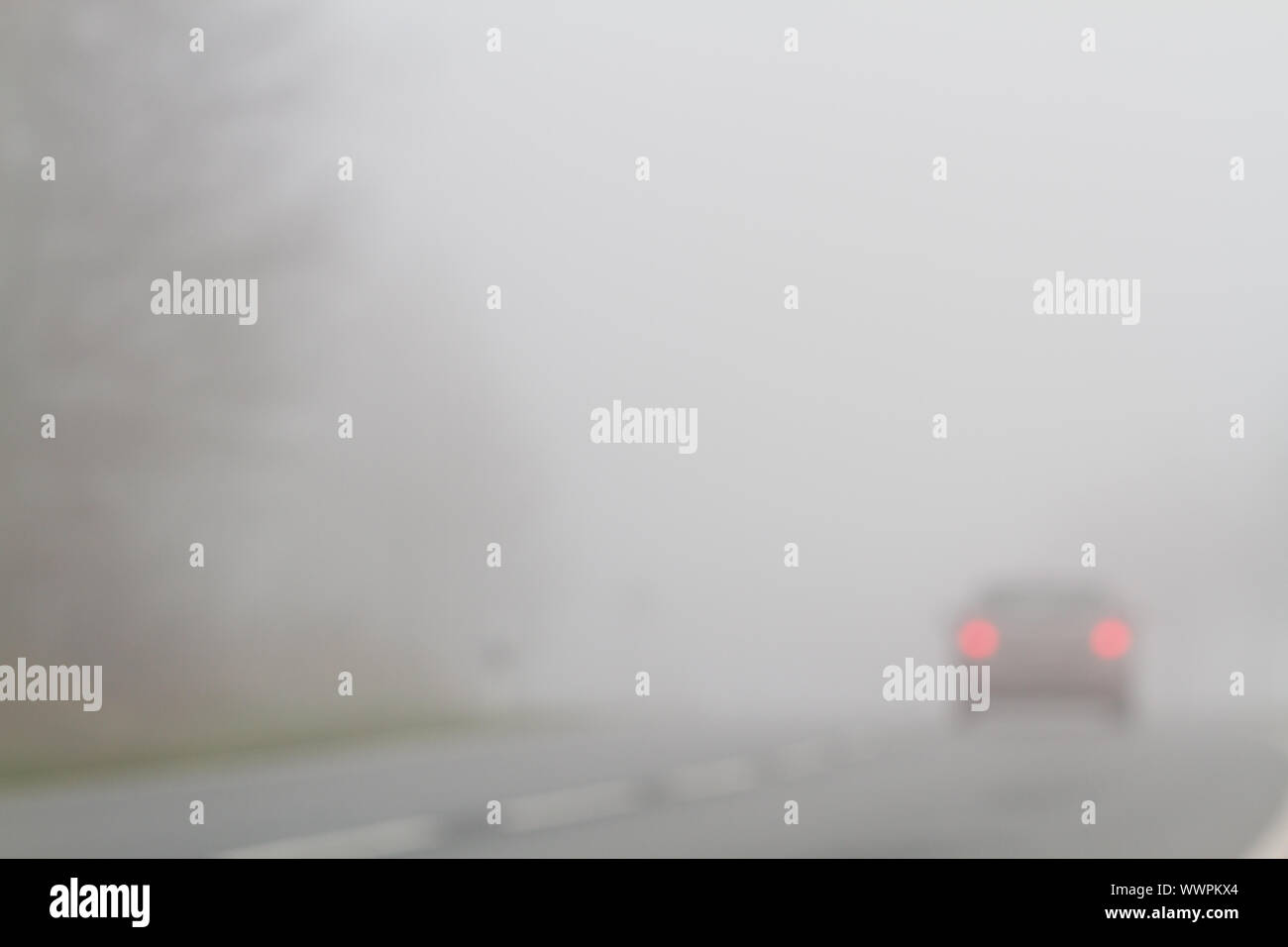 Street in the fog Stock Photo - Alamy