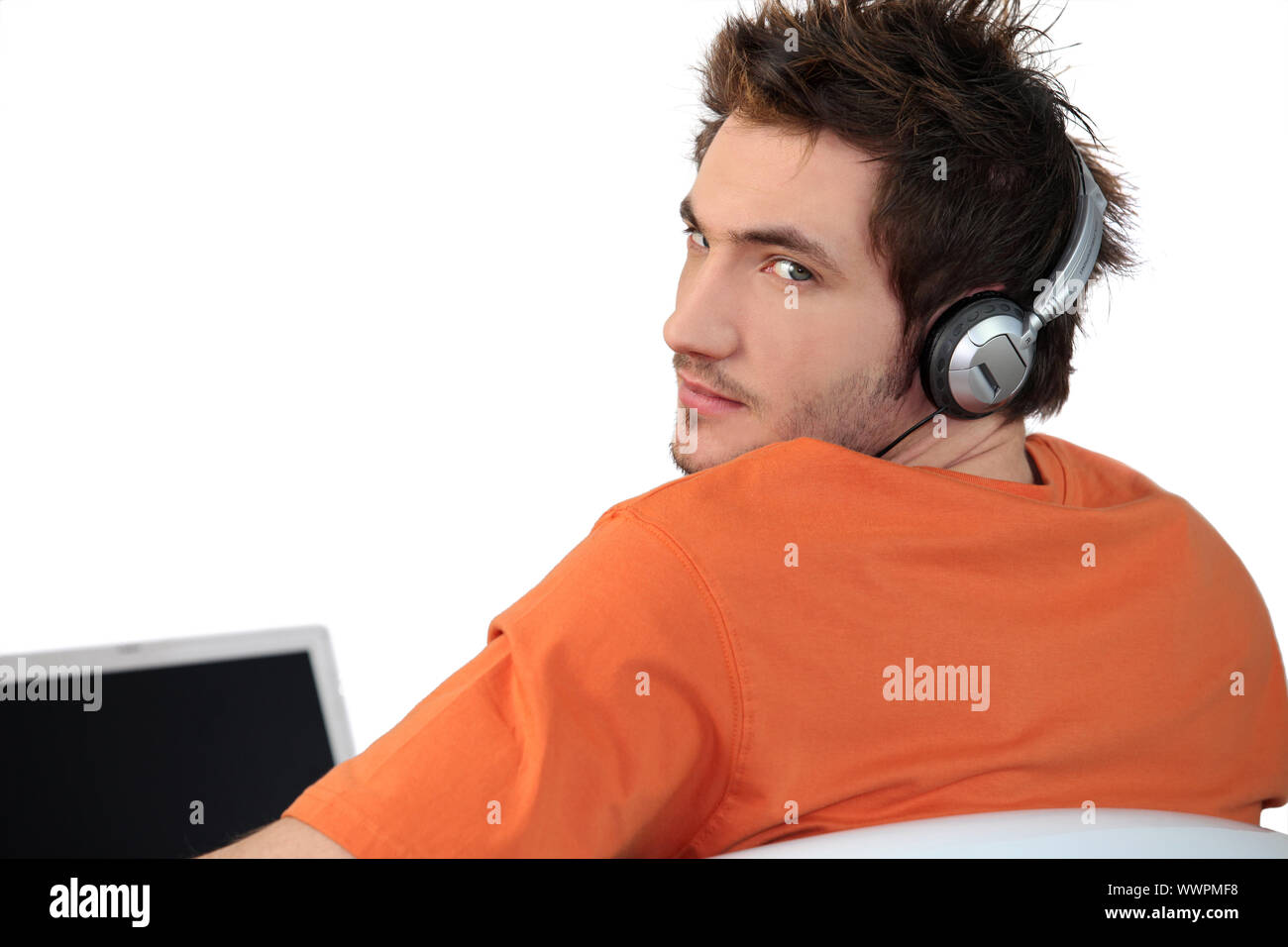 An angry man listening to music Stock Photo - Alamy