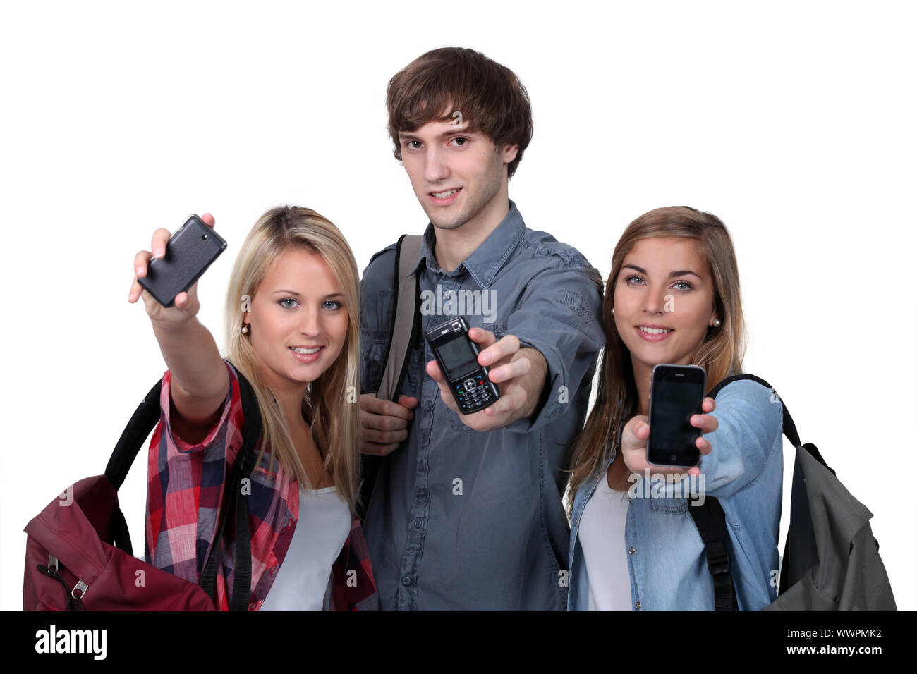 Teenagers showing mobile phones Stock Photo - Alamy