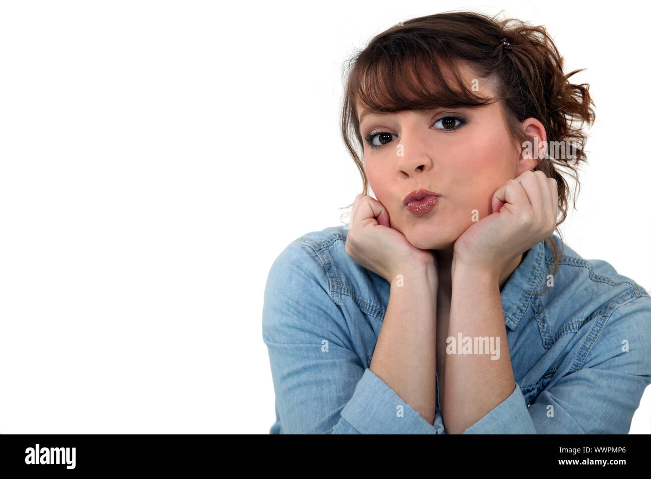 Woman with pursed lips Stock Photo - Alamy