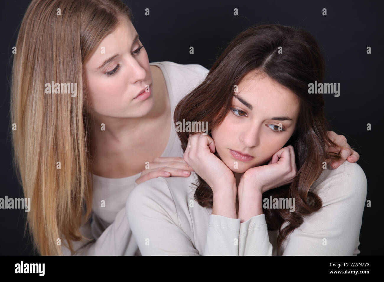 Woman consoling her friend Stock Photo - Alamy