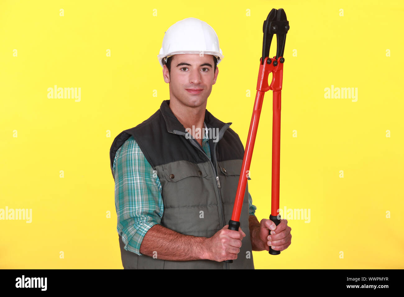 Man with boltcutters Stock Photo - Alamy