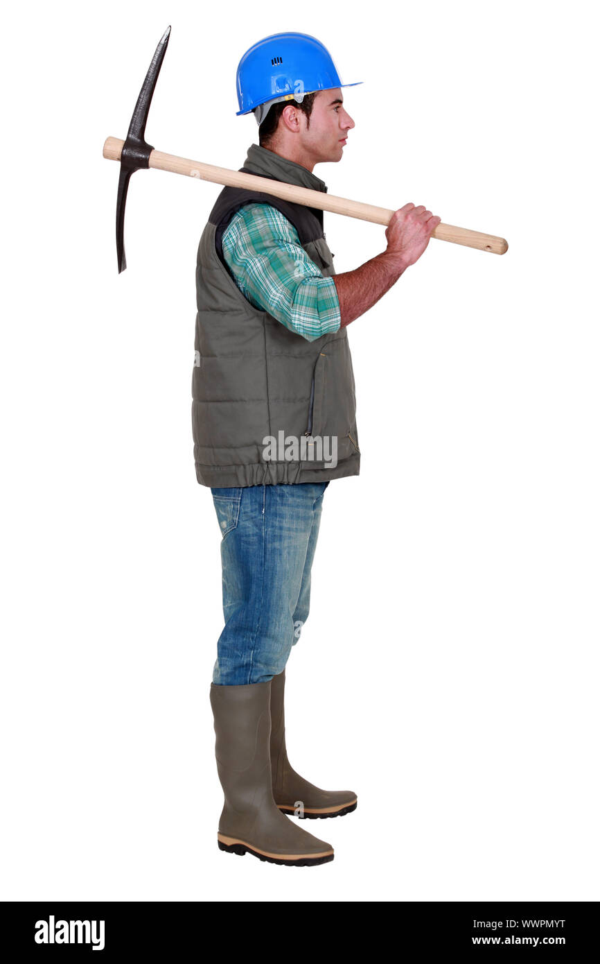 Worker carrying wood construction Cut Out Stock Images & Pictures - Alamy