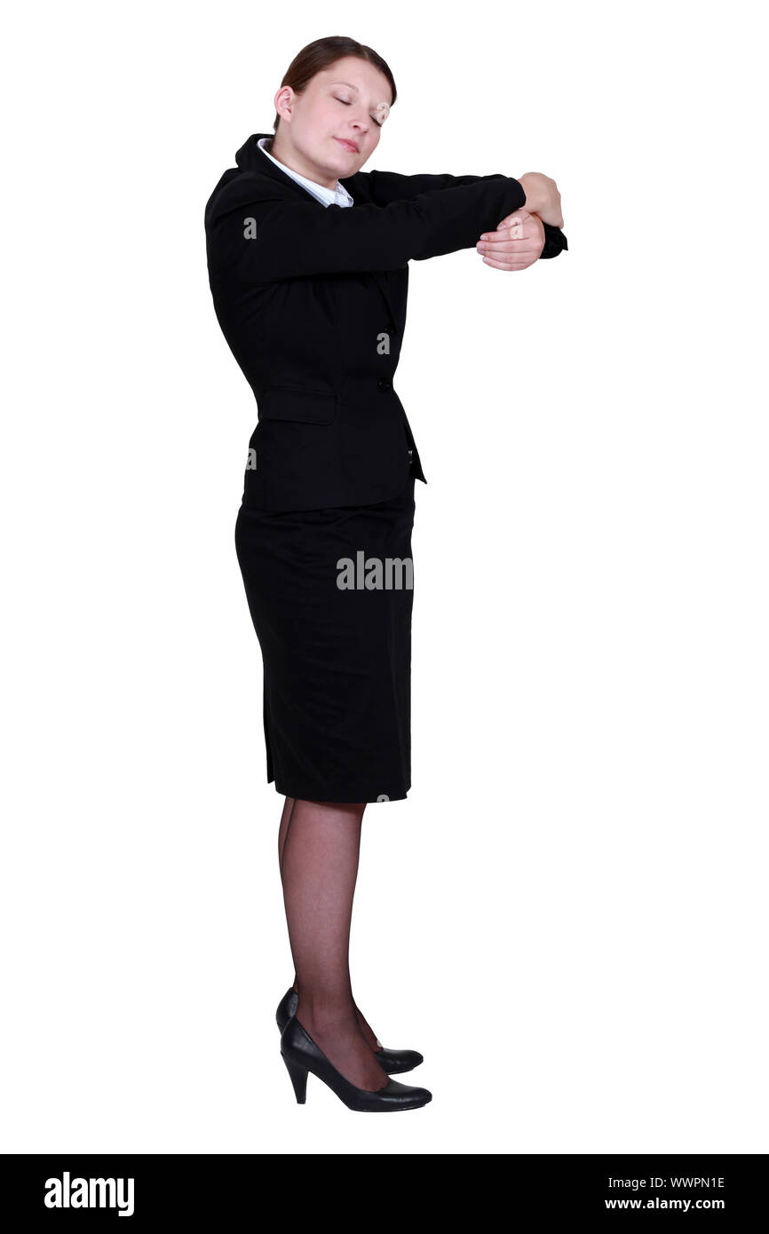 Businesswoman hugging an invisible object Stock Photo - Alamy