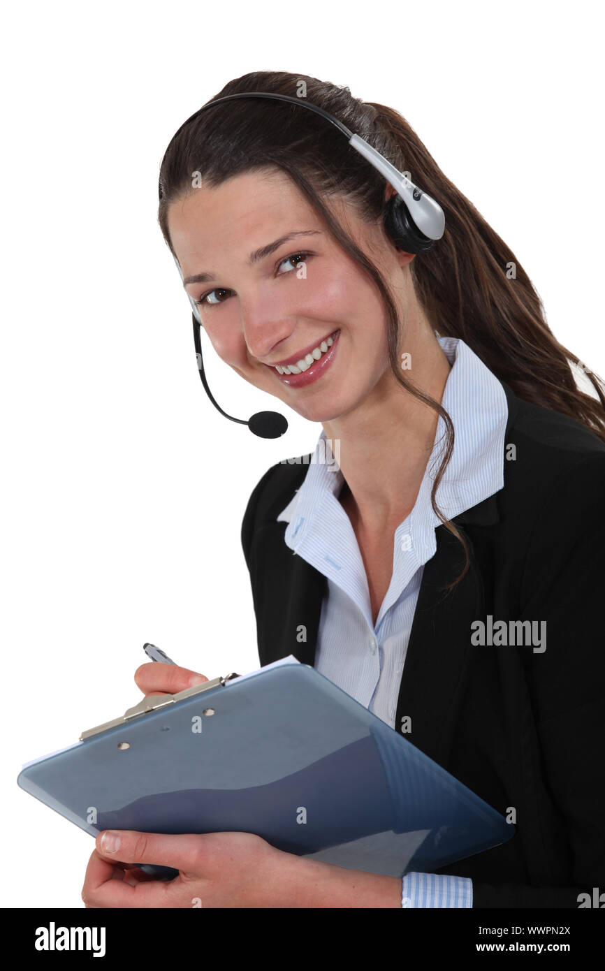 Cheerful call-center supervisor with clip-board Stock Photo - Alamy