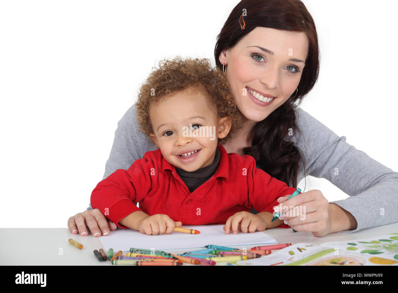 Woman and child colouring Stock Photo - Alamy