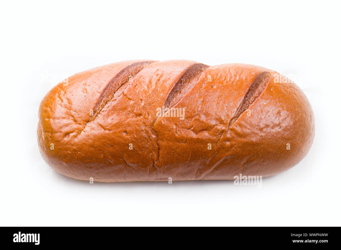 Large loaf of bread isolated on white Stock Photo - Alamy