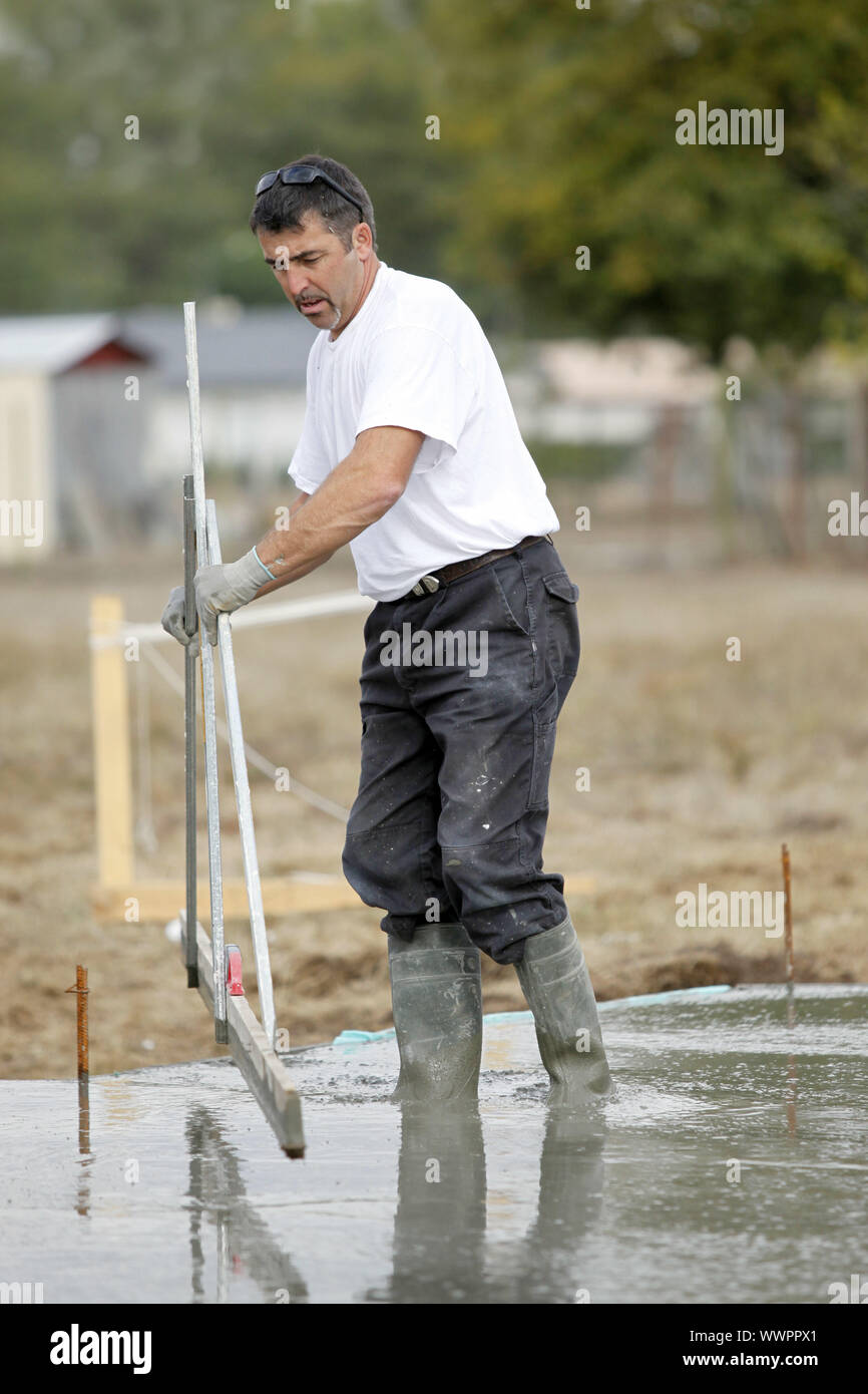 Using long poles hi-res stock photography and images - Alamy