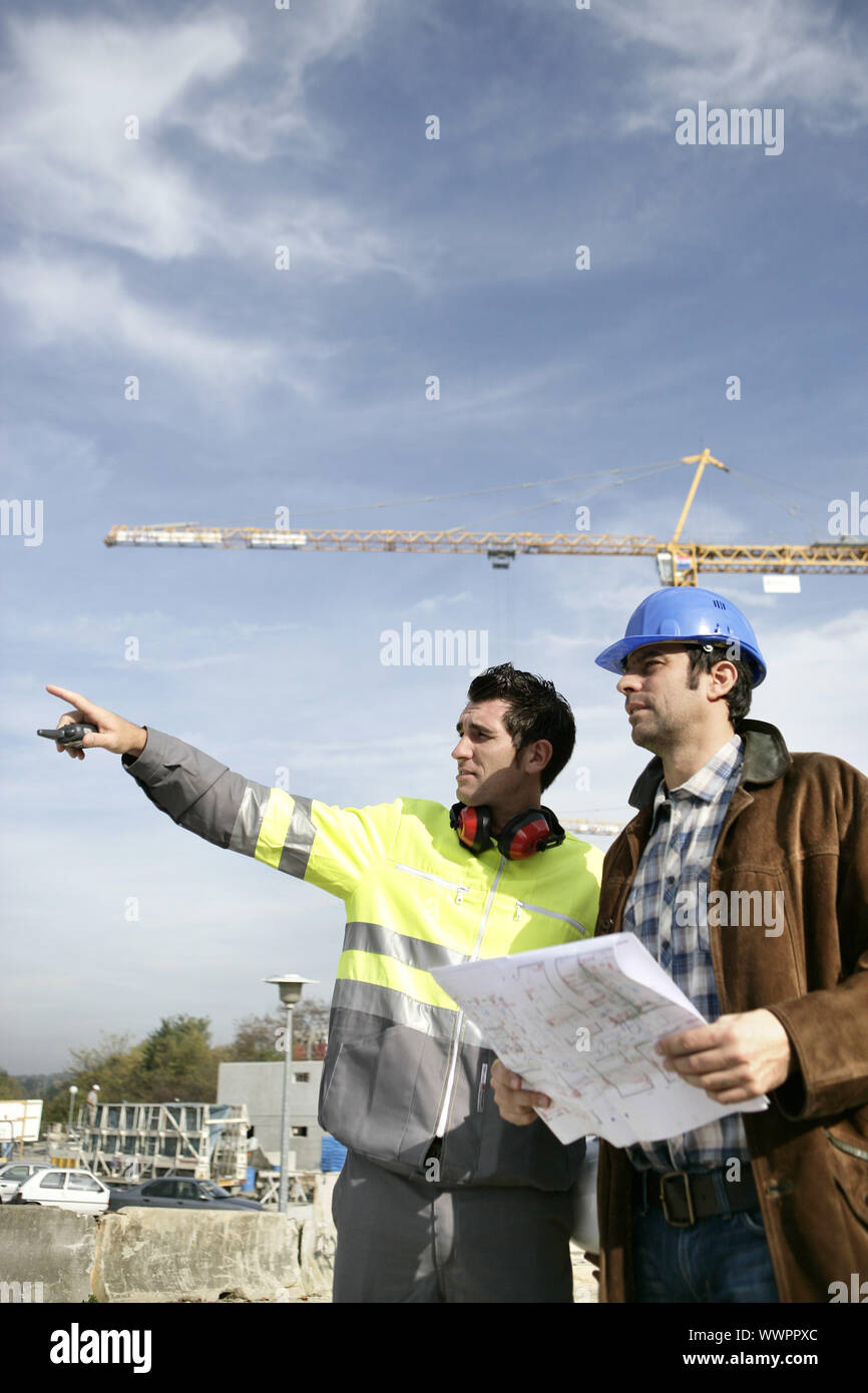 Engineers on a building site Stock Photo - Alamy