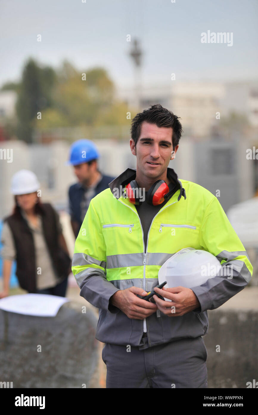 Foreman surveying construction Stock Photo - Alamy