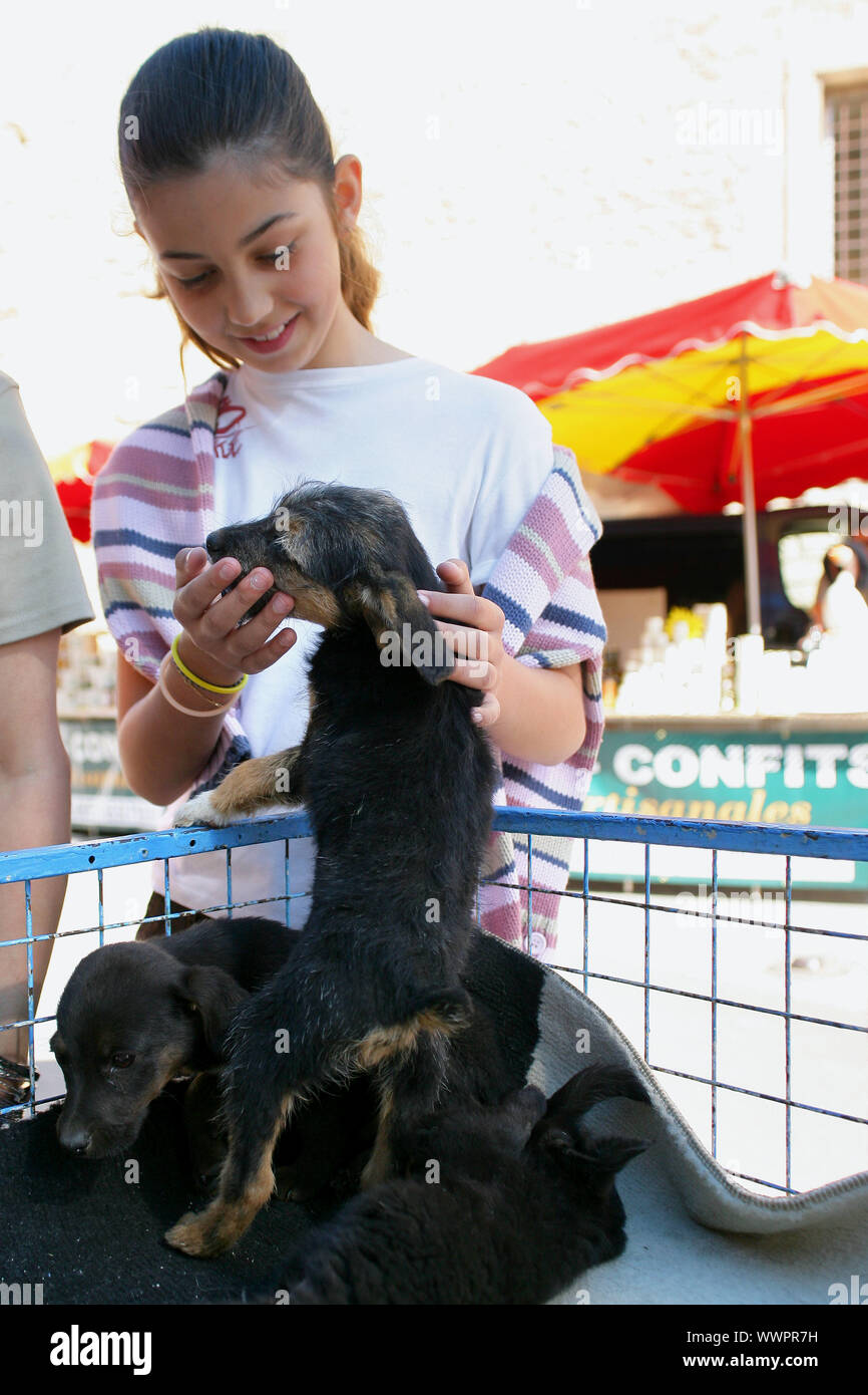 Hand caressing baby girl face hi-res stock photography and images - Alamy