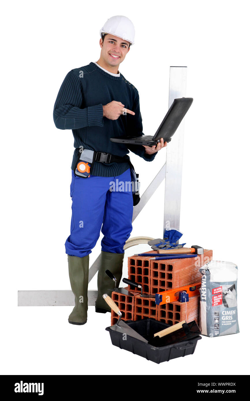 Craftsman man laying blocks hi-res stock photography and images - Alamy