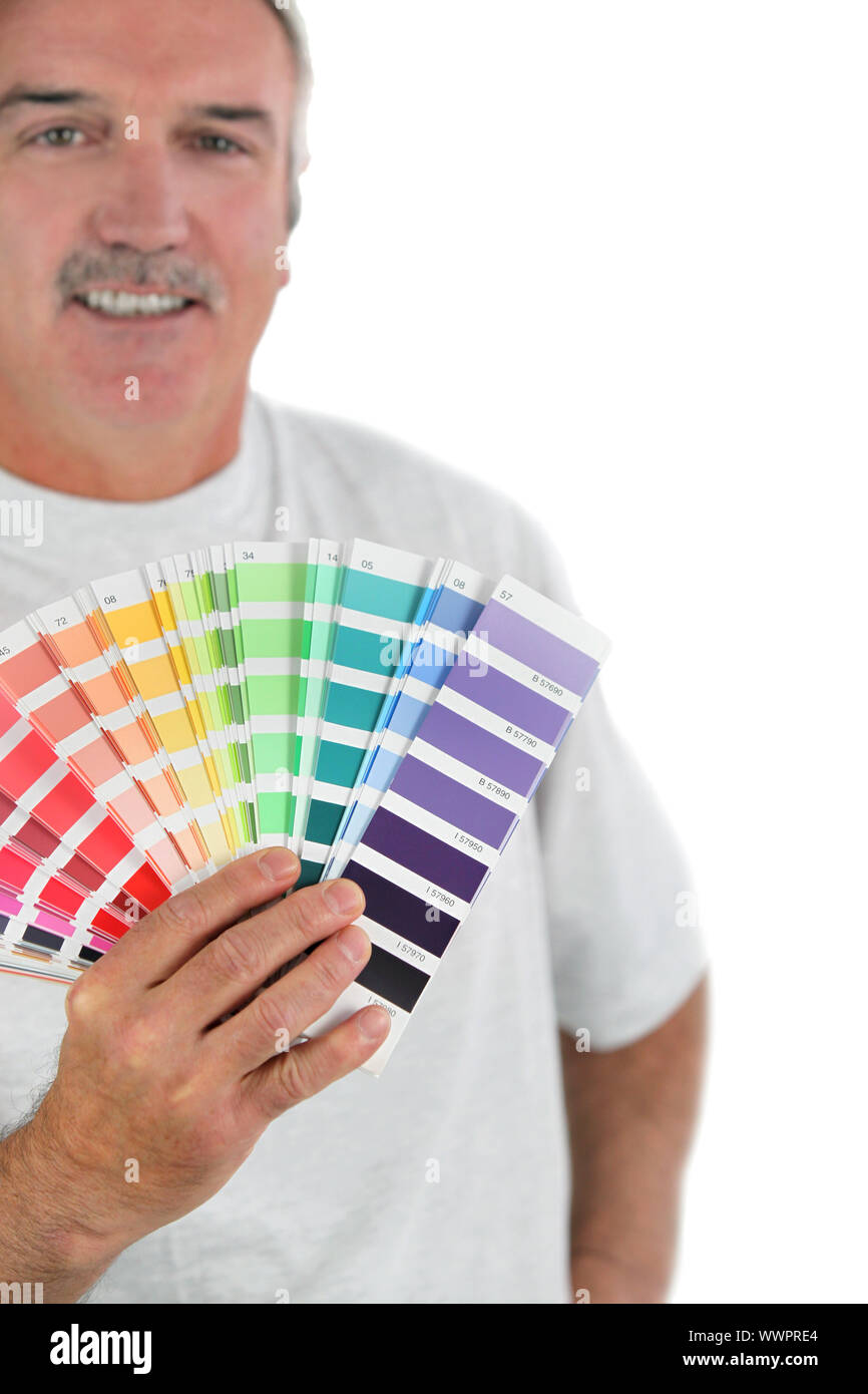Decorator holding color charts Stock Photo - Alamy