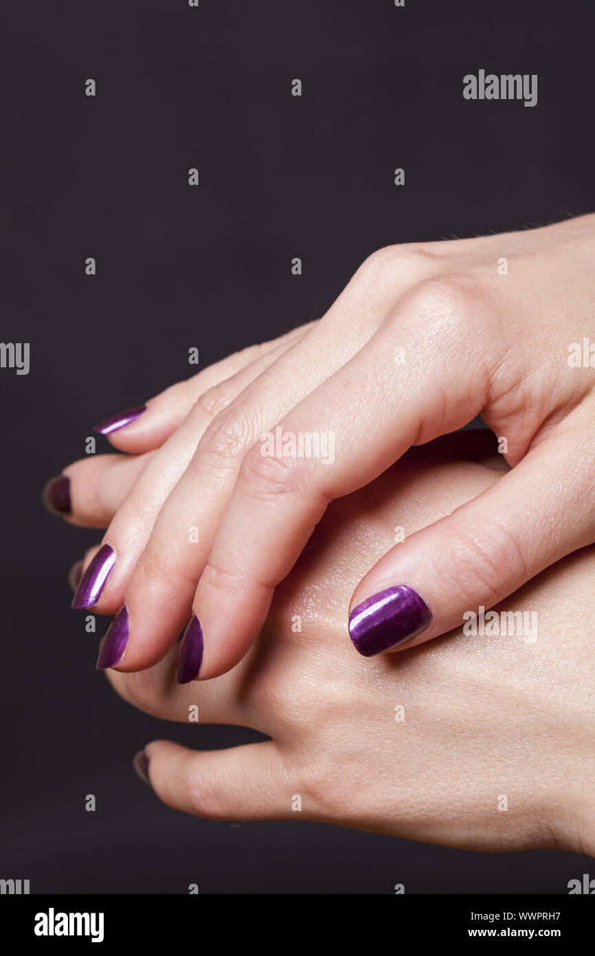 Female hands as close-up isolated from black Stock Photo - Alamy