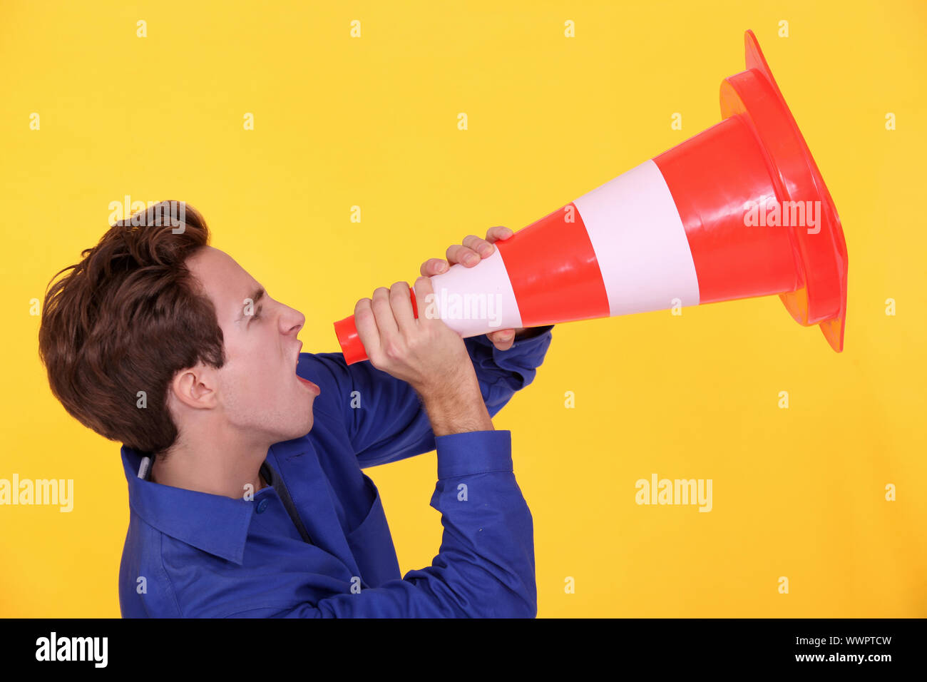Man shouting traffic cone hi-res stock photography and images - Alamy
