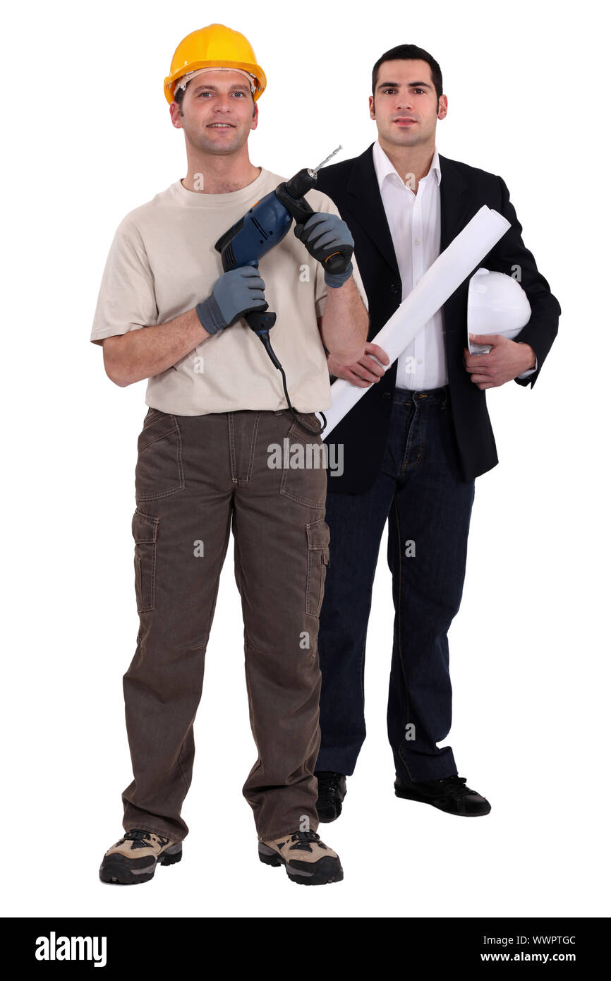 Builder stood with architect Stock Photo - Alamy