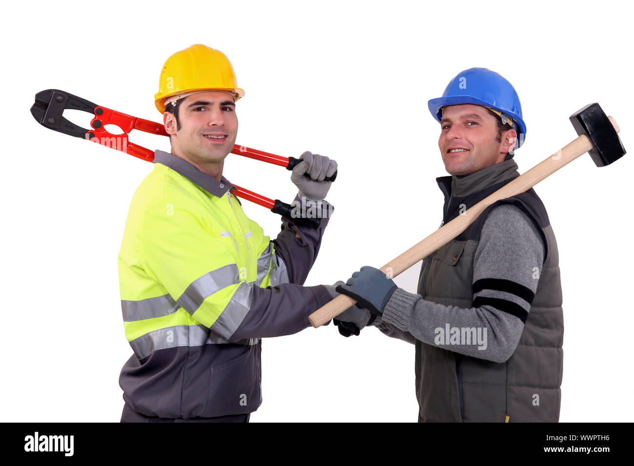 Workmen shaking hands Stock Photo - Alamy
