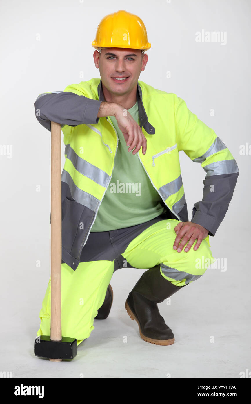 Man with a sledgehammer Stock Photo - Alamy