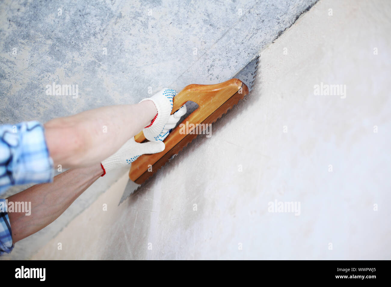 work aligns with a spatula wall Stock Photo - Alamy