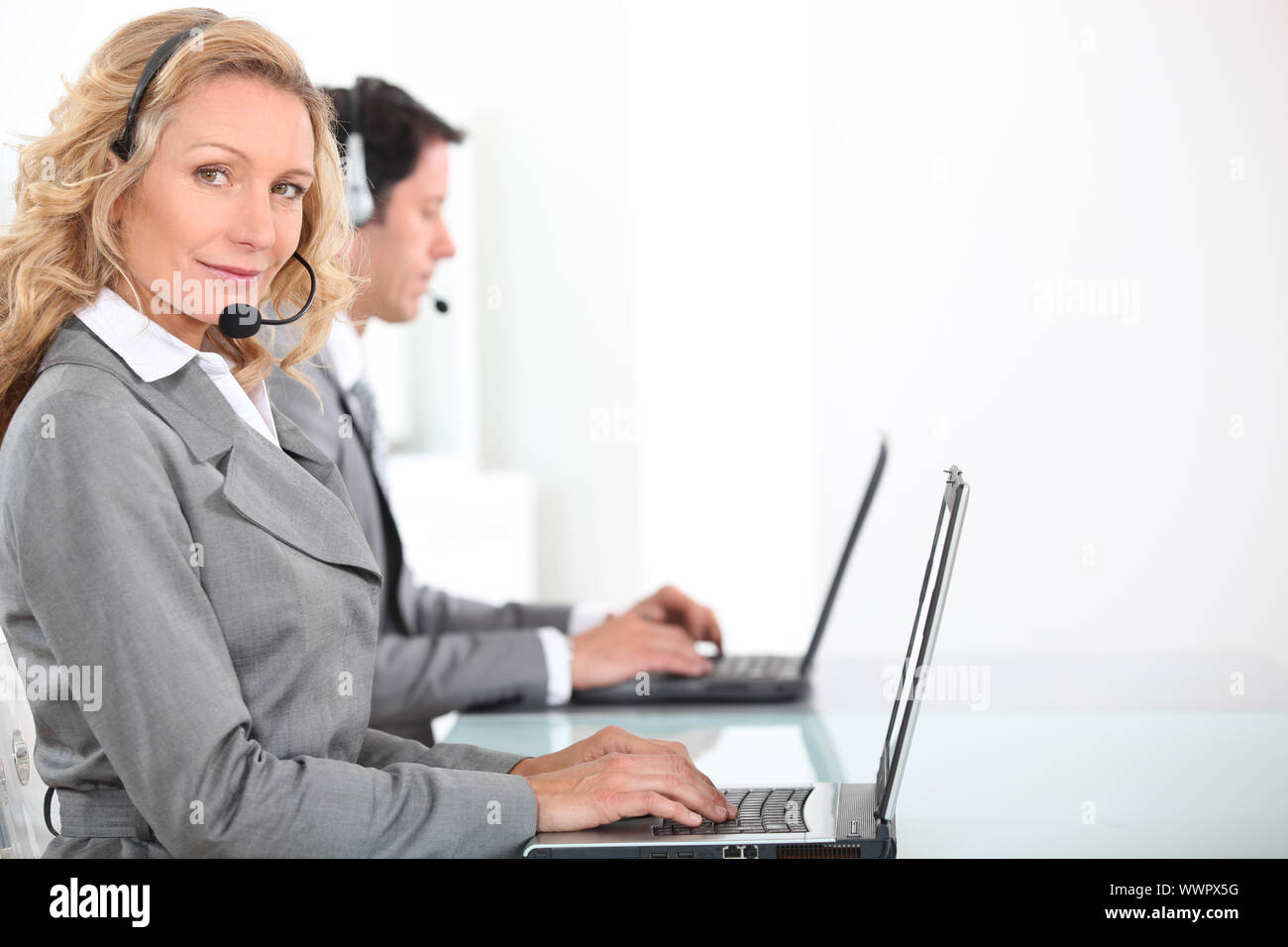 Call centre workers Stock Photo - Alamy