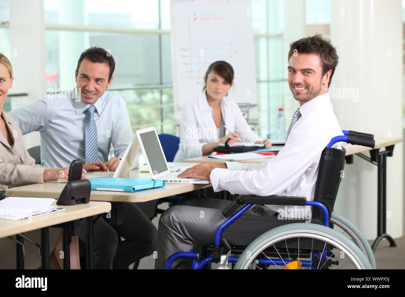 Female secretary wheelchair hi-res stock photography and images - Alamy