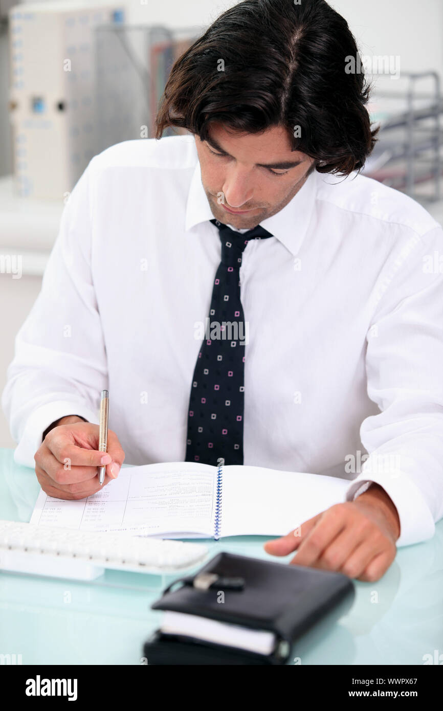 office worker reading Stock Photo - Alamy