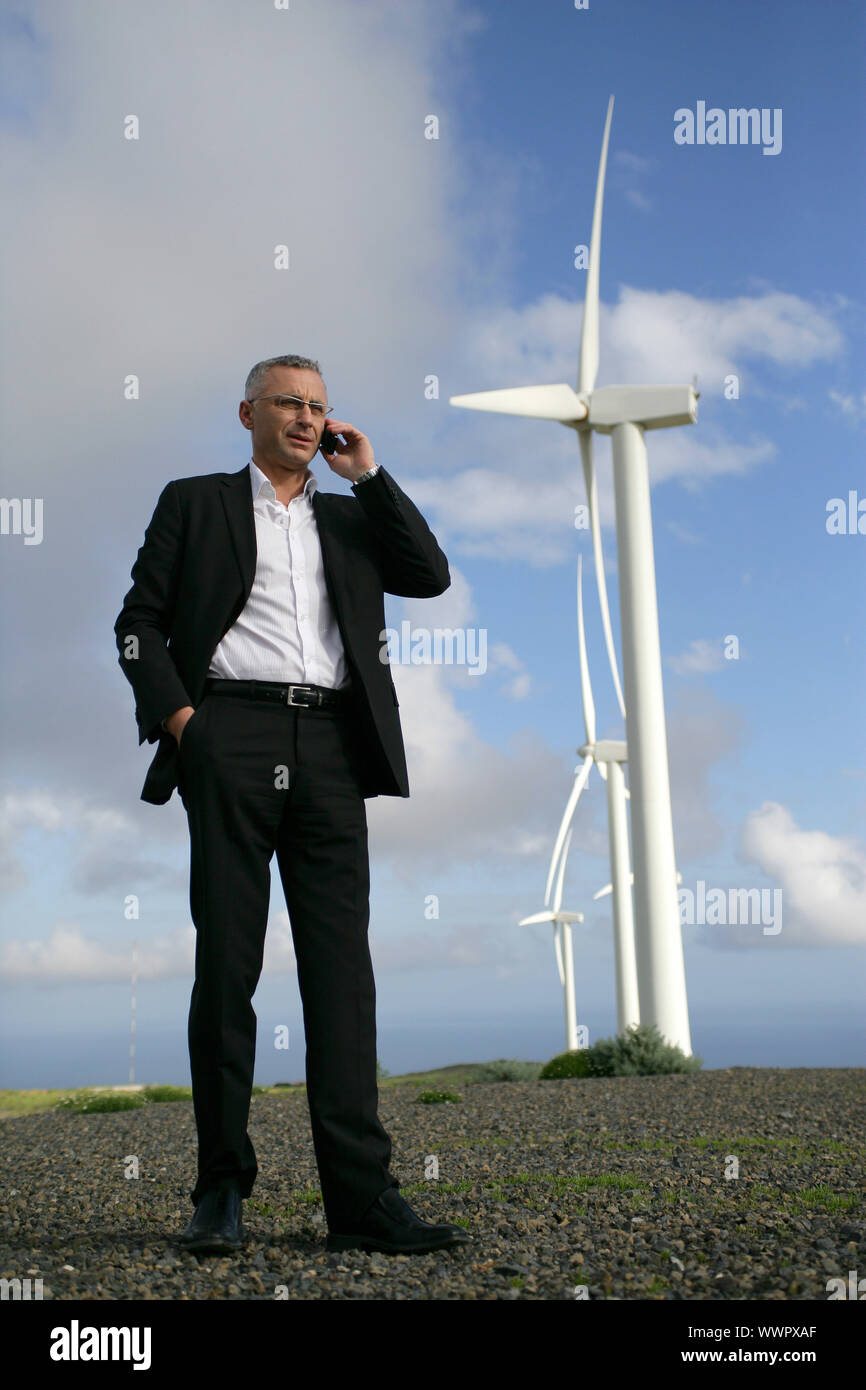 some windmills and a man Stock Photo - Alamy